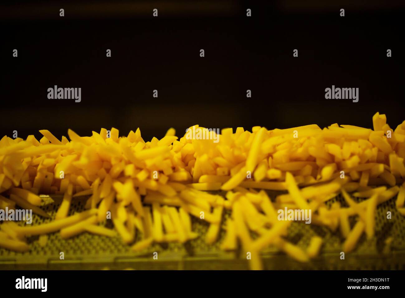 Production line of a potato factory. French fries - fast food Stock ...