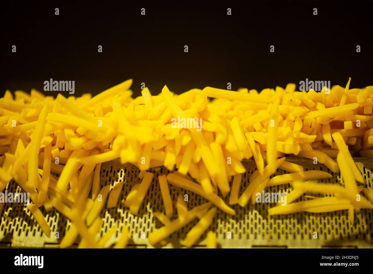 Production line of a potato factory. French fries - fast food Stock ...