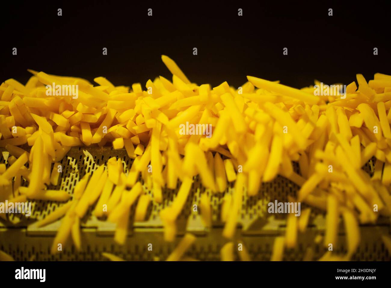 Production line of a potato factory. French fries - fast food Stock ...