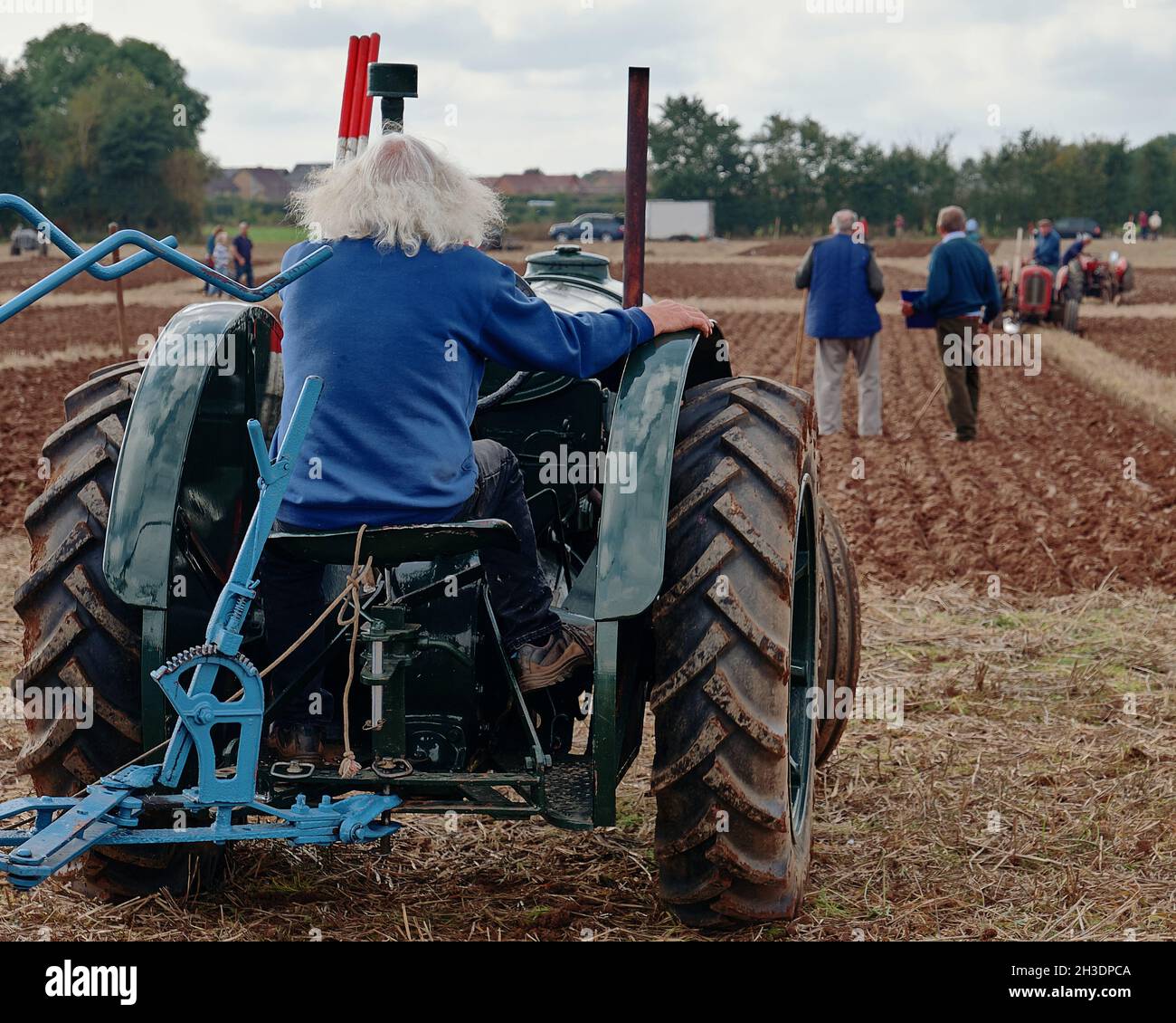 Blue tractor from behind at Warwickshire ploughing match Stock Photo ...