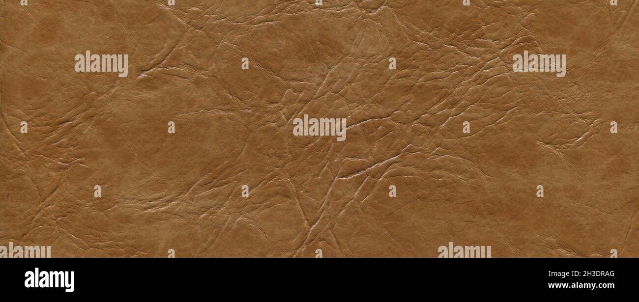 Imitation cowhide beige texture close up, useful as background for any ...