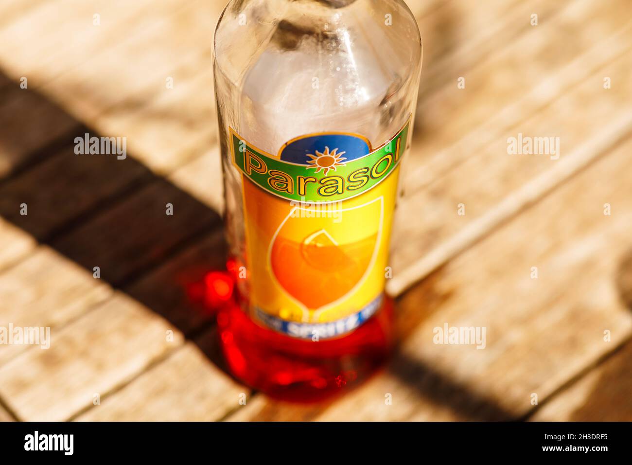 Aperol Spritz cocktail on a tabletop with sunflowers in a French pizza ...