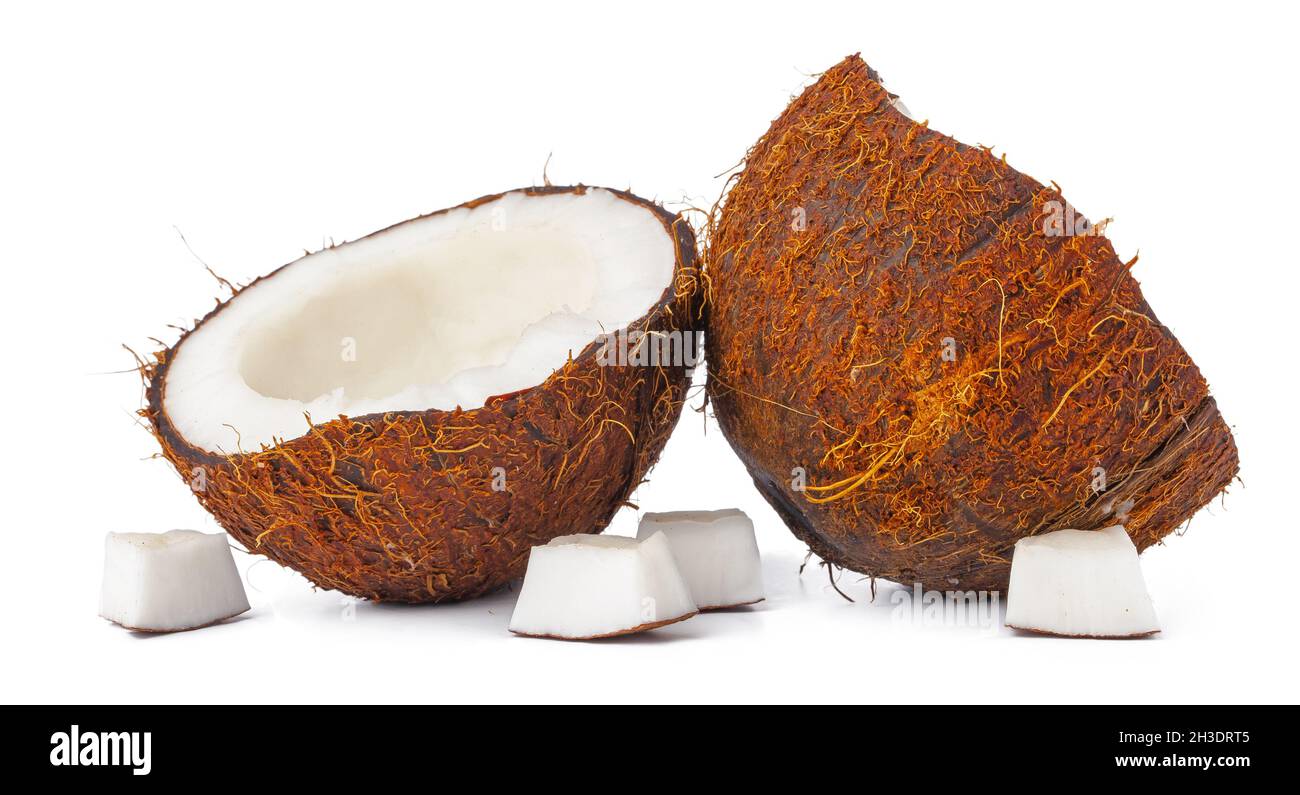 Coco nut halves isolated on white background Stock Photo - Alamy