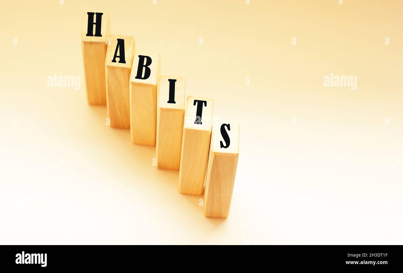 Word HABIT made from building blocks on a white background Stock Photo ...