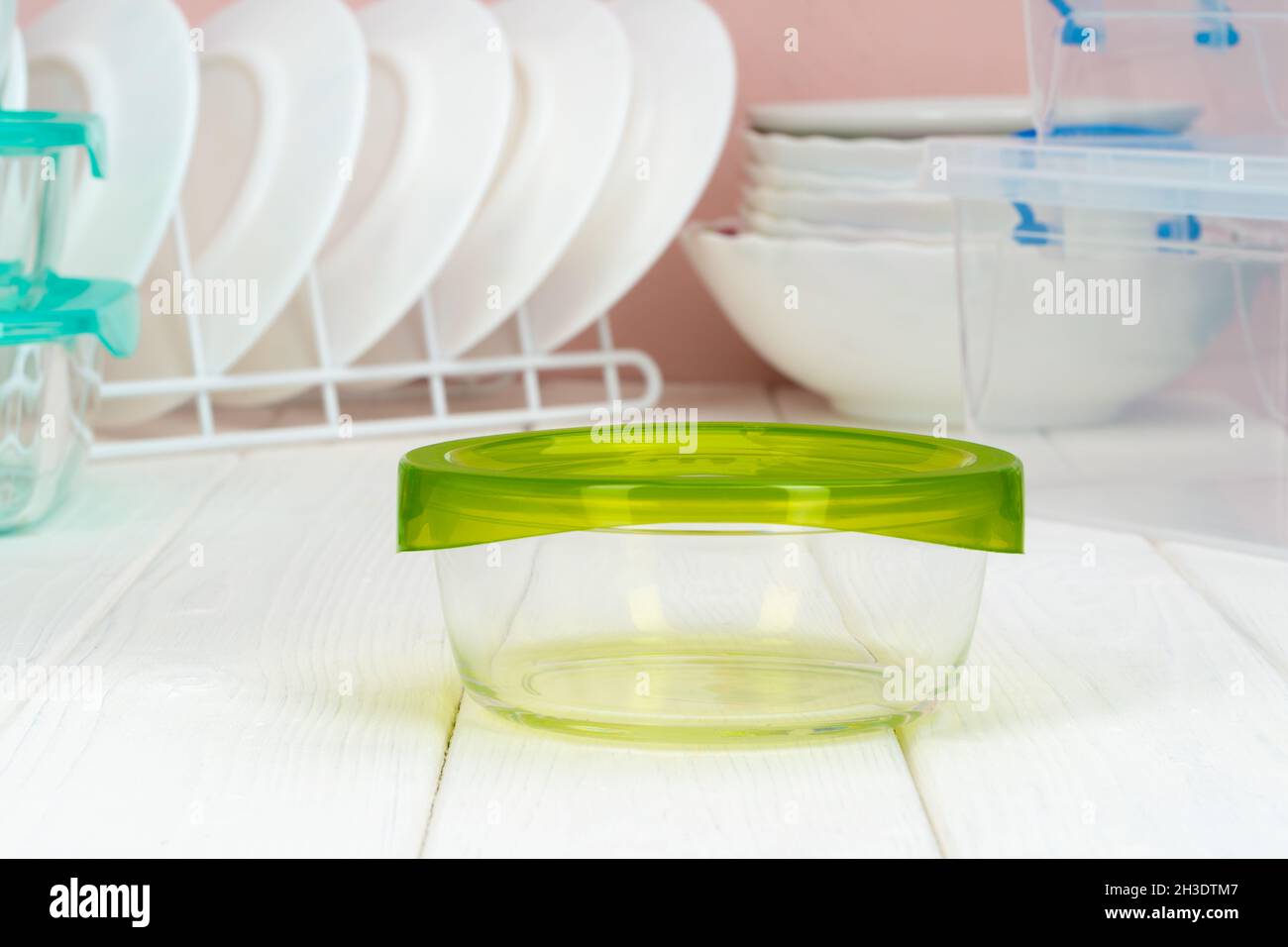 Clean kitchen with various plates and food boxes Stock Photo - Alamy
