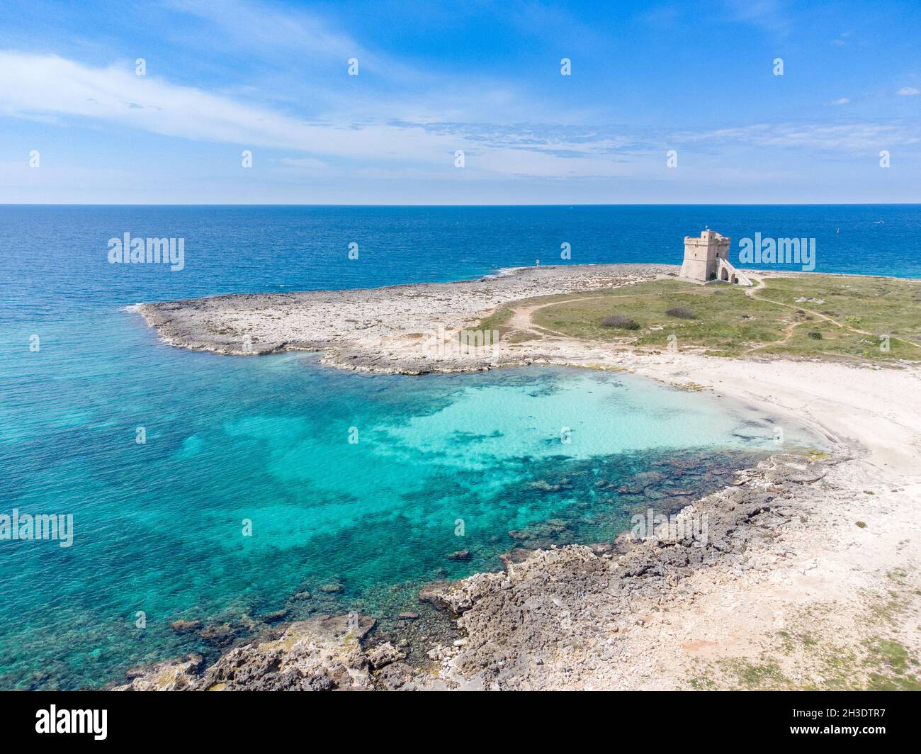 Scenic view of Squillace tower in the sea in Porto Cesareo, Italy Stock ...