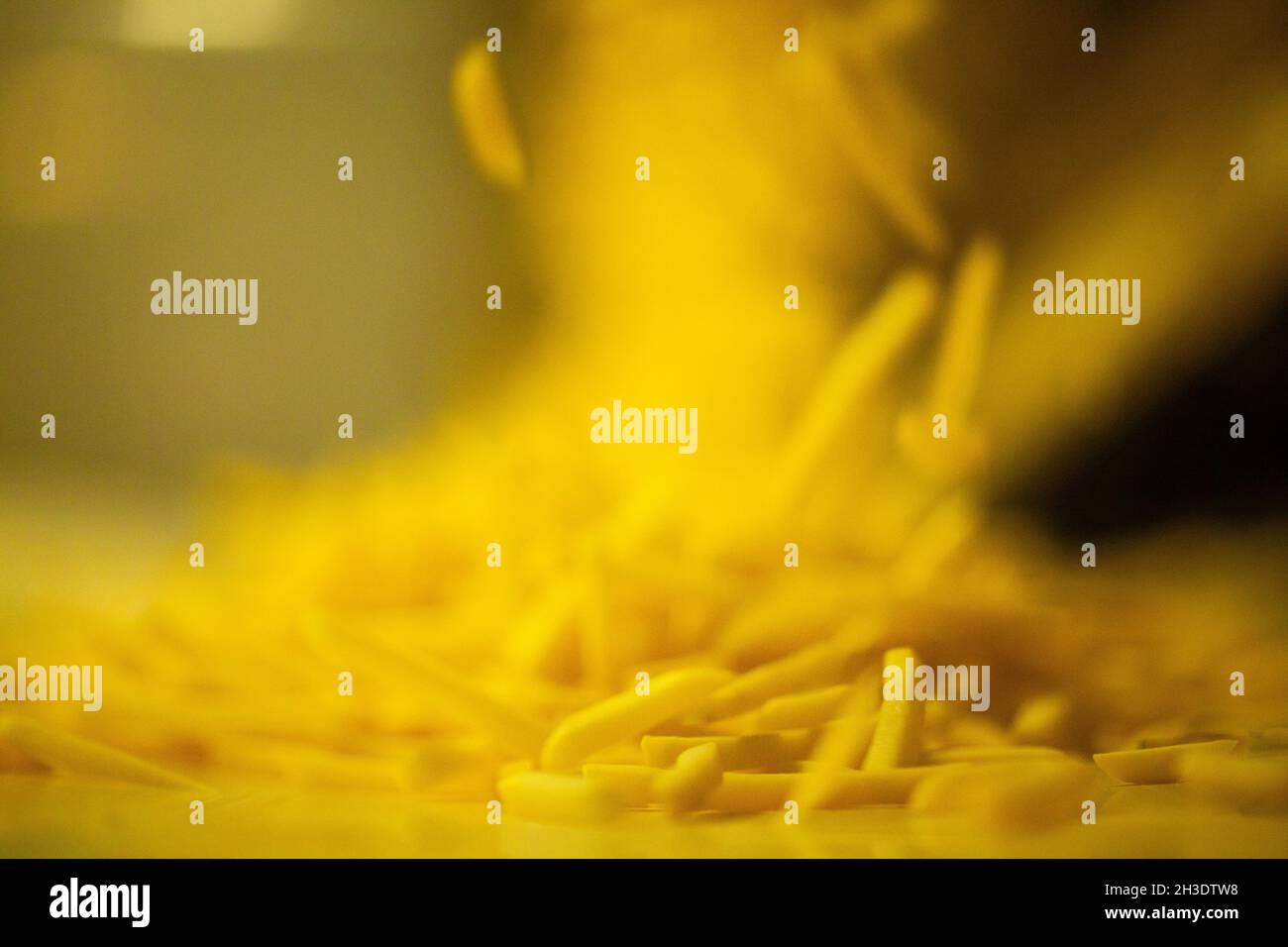 Production line of a potato factory. French fries - fast food Stock ...