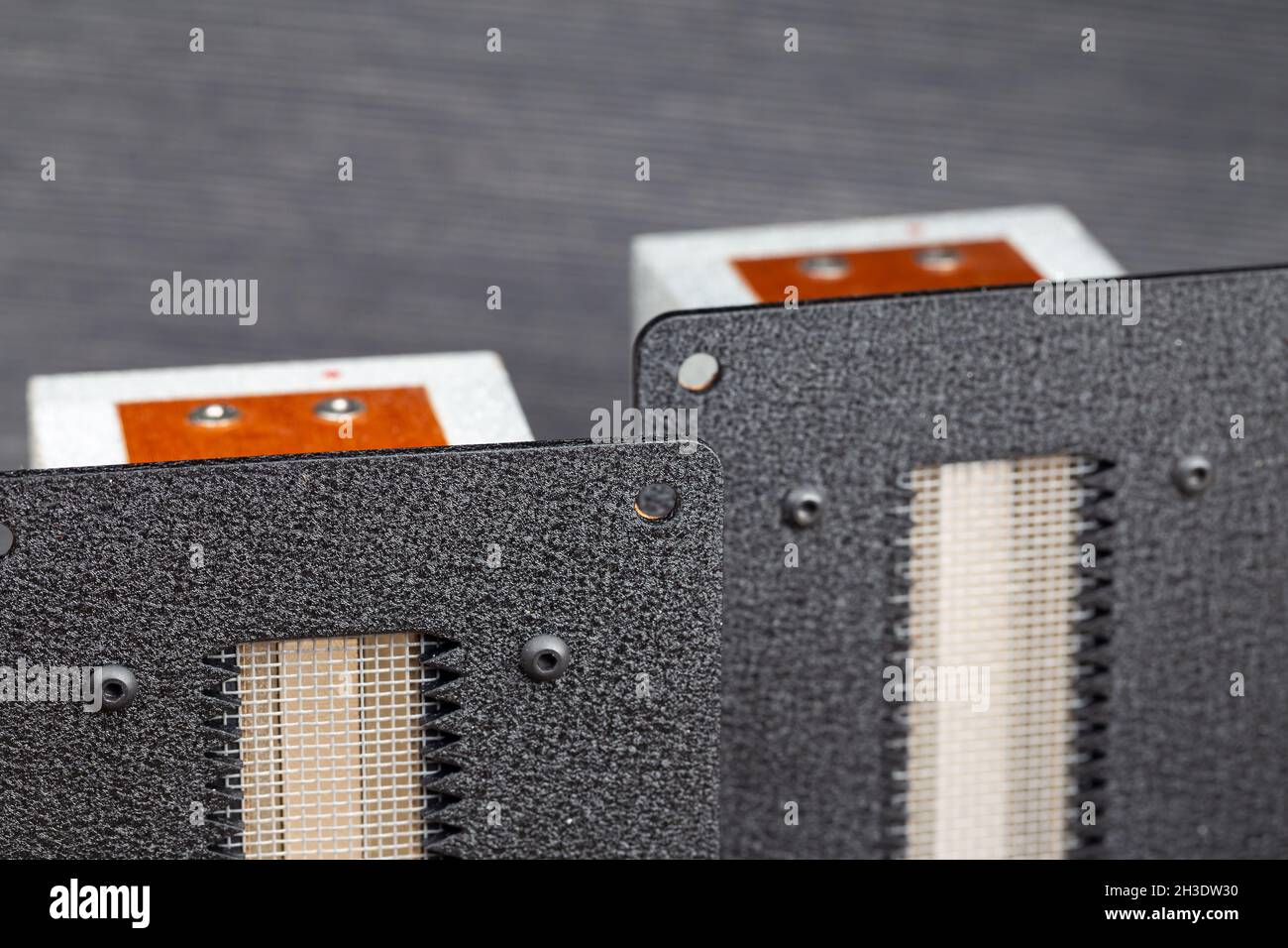 Flat foil ribbon tweeters presented against a gray background. Photo ...