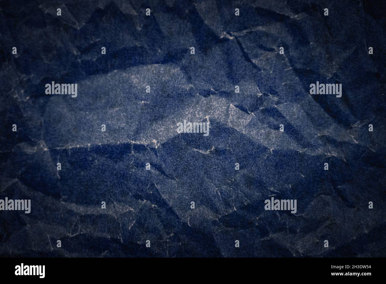 Crumpled dark blue paper texture background Stock Photo - Alamy