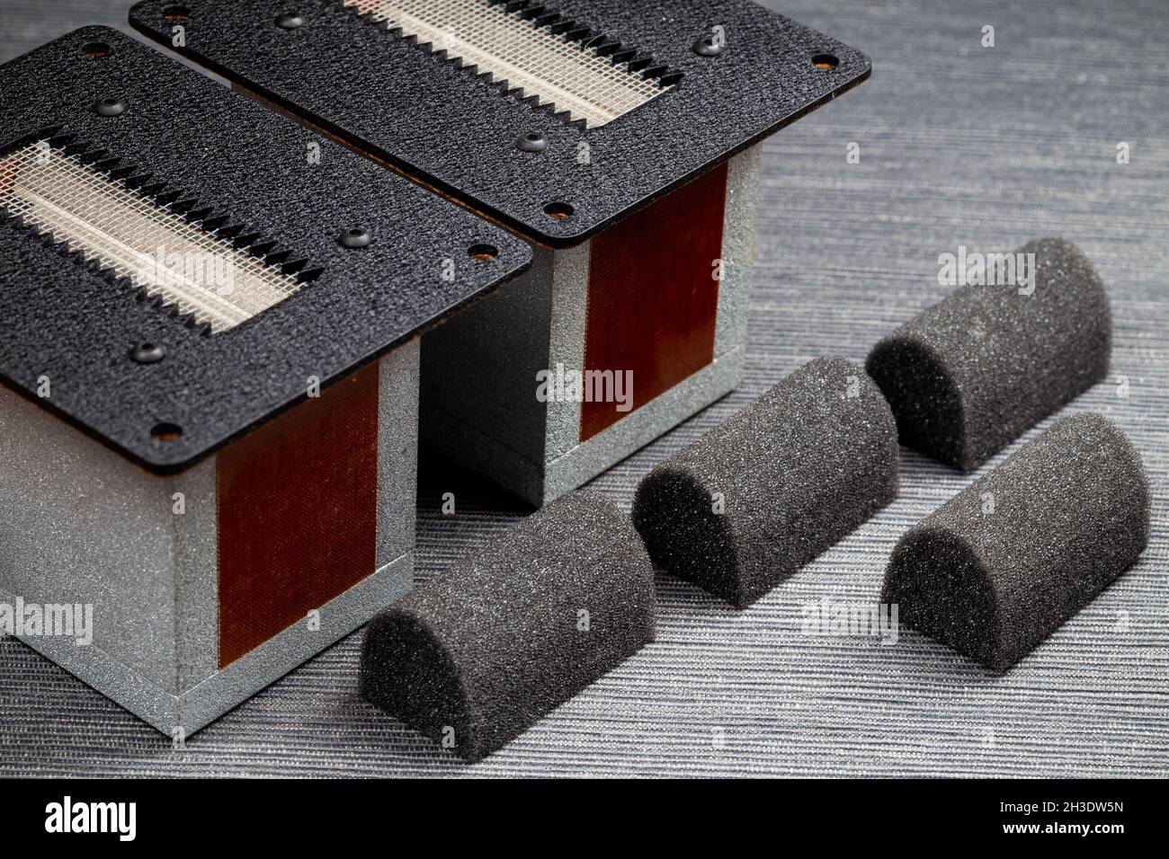 Flat foil ribbon tweeters presented against a gray background. Photo ...