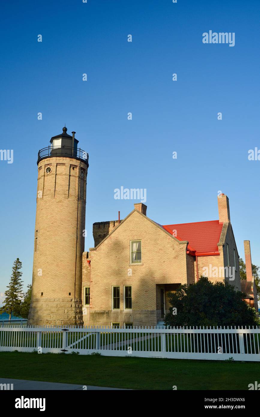 Brick house picket fence hi-res stock photography and images - Alamy
