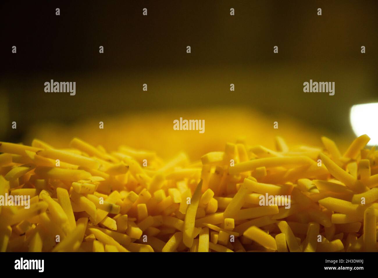 Production line of a potato factory. French fries - fast food Stock ...