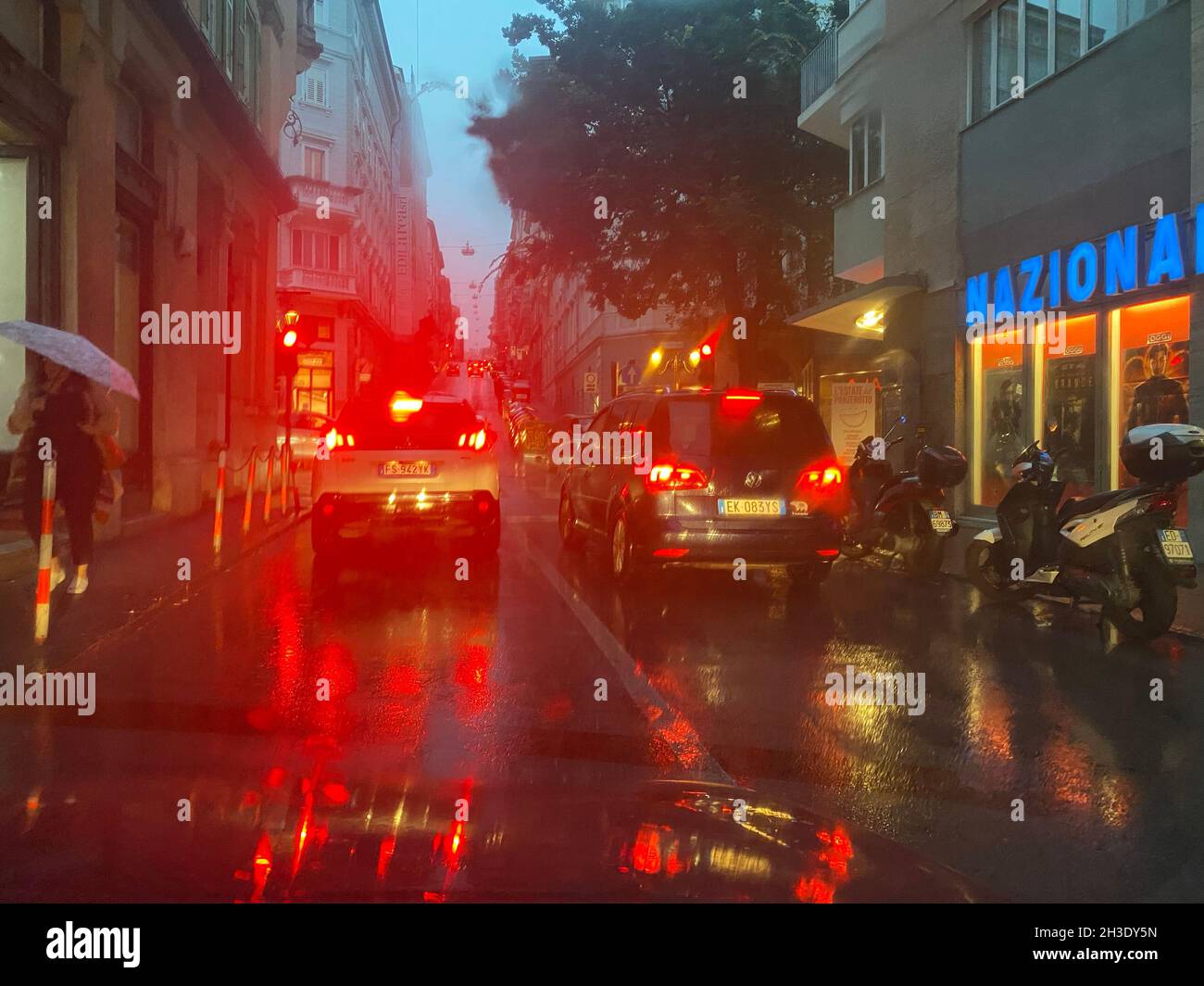 Trieste, Italy - September, 16: A car on the road when it weather rainy ...