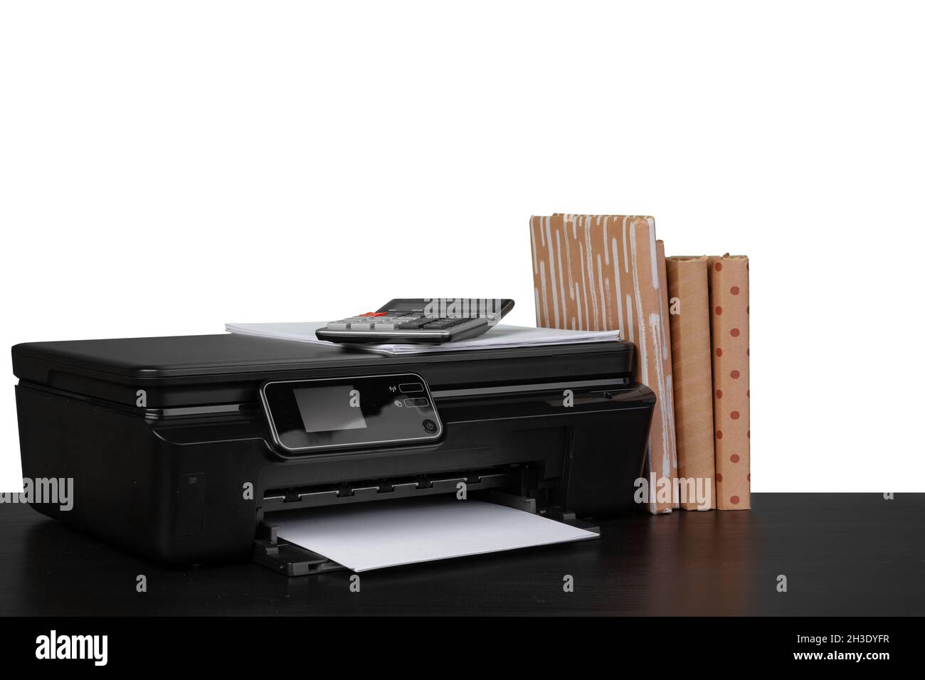 Office table with laser printer and books against white background ...