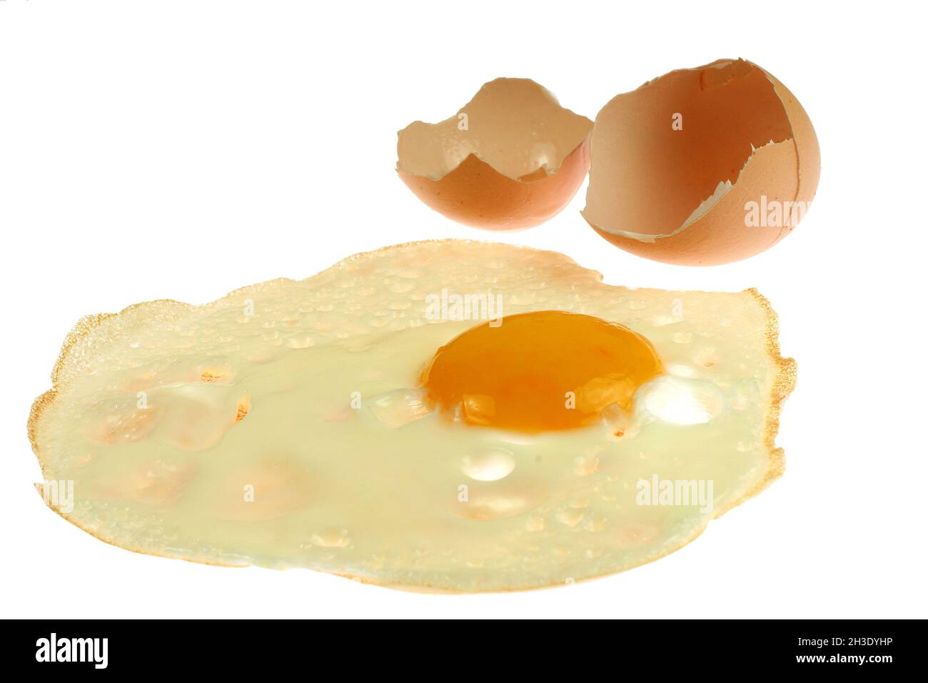fried egg and egg shells, cut-out Stock Photo - Alamy