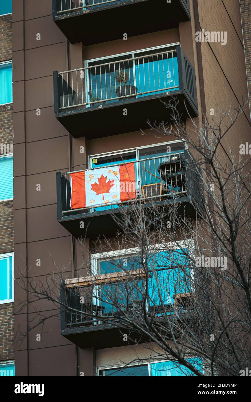 CALGARY, CANADA - Oct 27, 2021: Canadian flag with orange hand prints ...