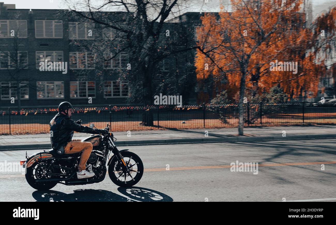 CALGARY, CANADA - Oct 26, 2021: Caucasian man riding Harley David ...