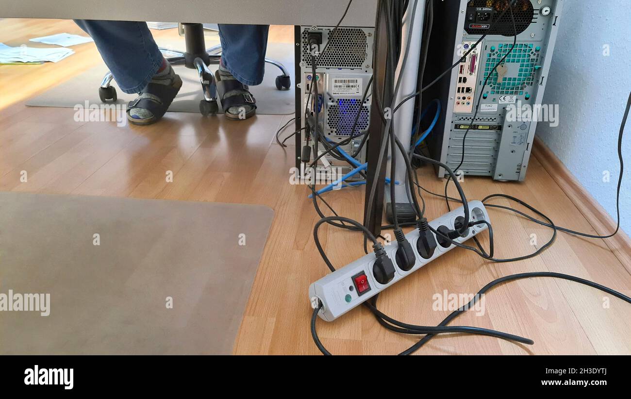 multiple socket outlet on the floor at a workplace in an office ...