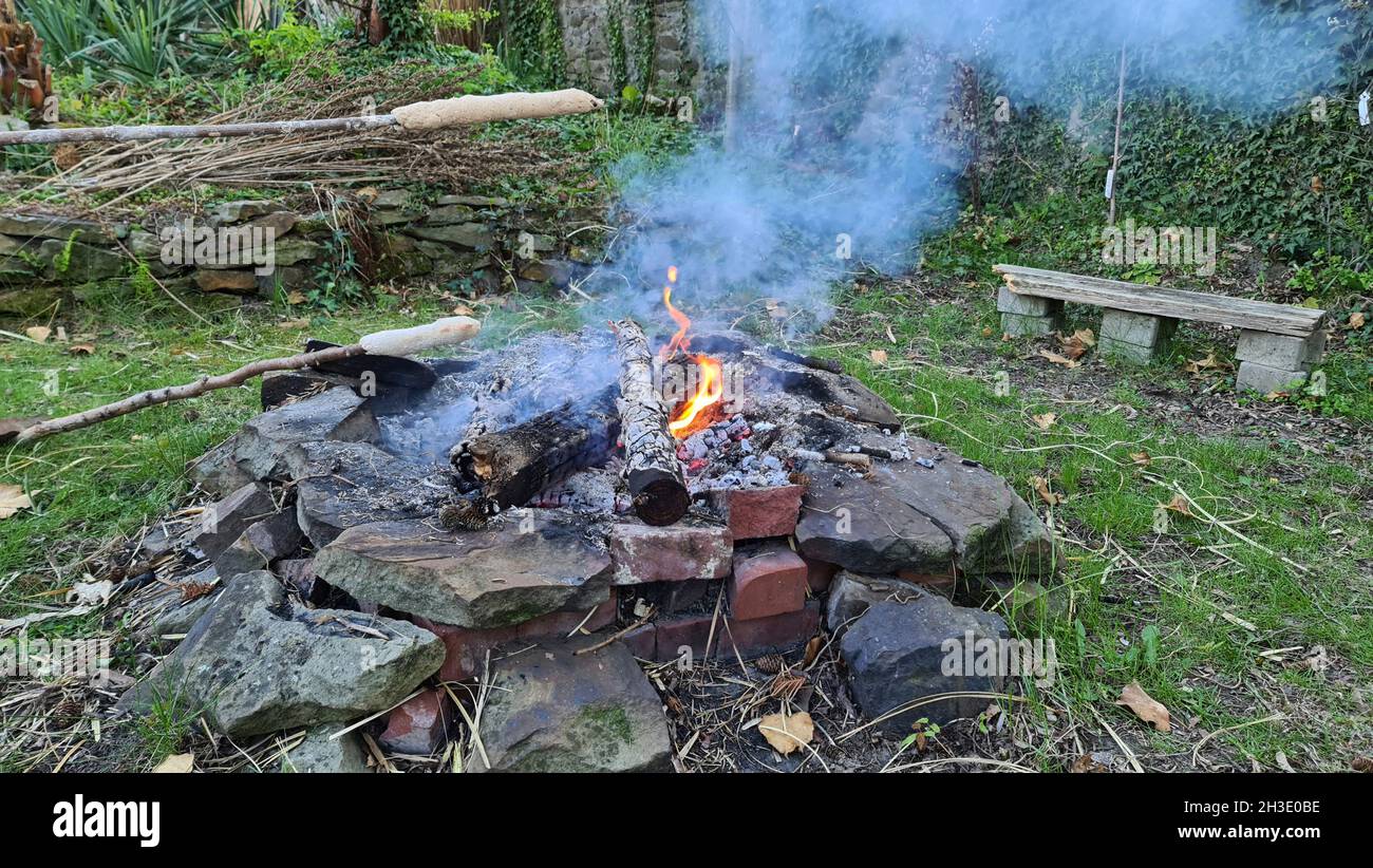 bonfire in a garden, Germany Stock Photo - Alamy