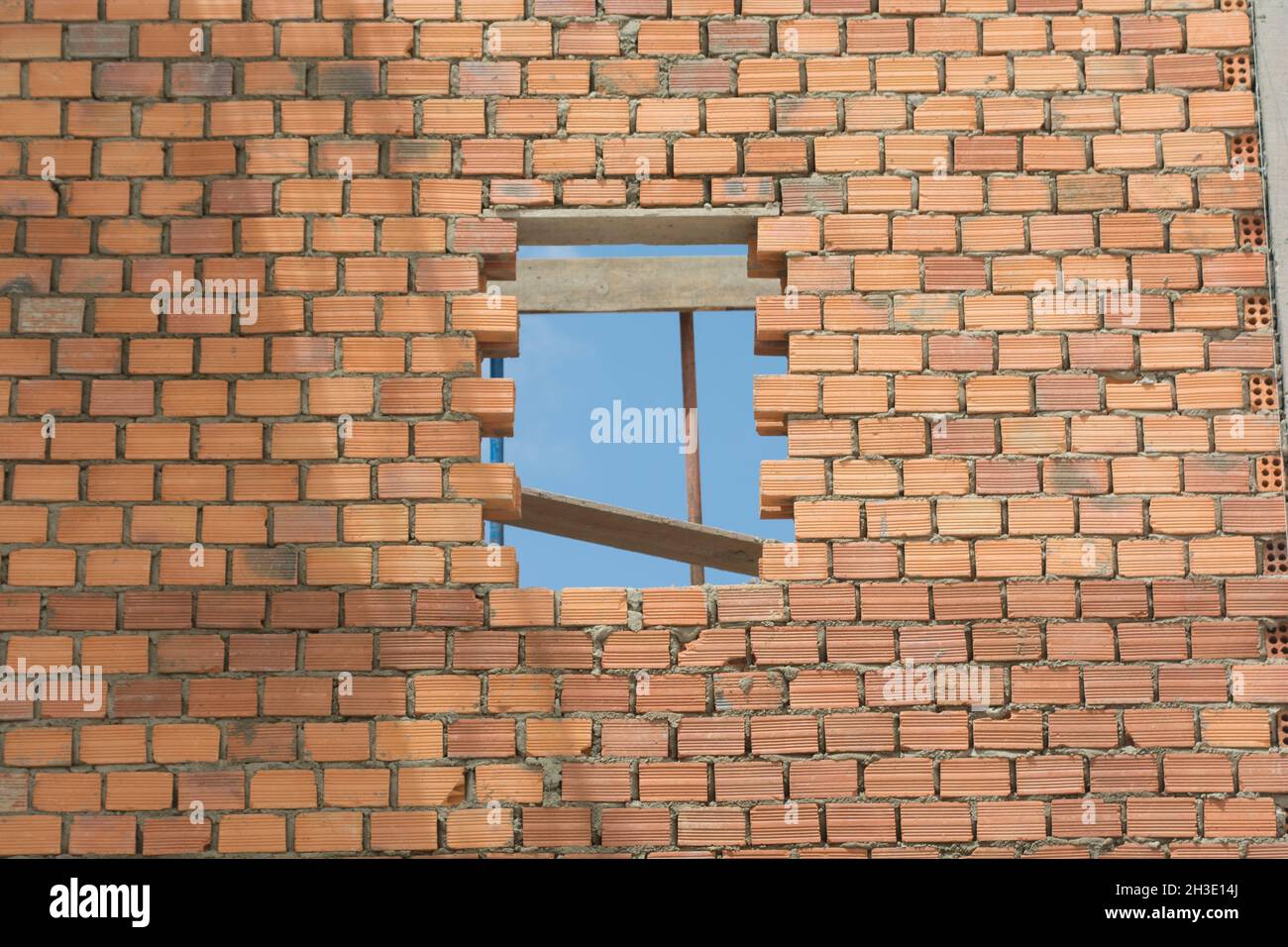 Window through a bricks wall Stock Photo - Alamy