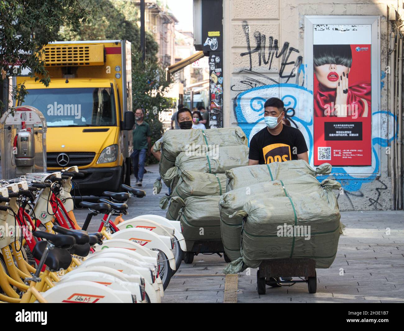 Shops freight transport by trolley in Chinatown Milan Italy Stock Photo ...