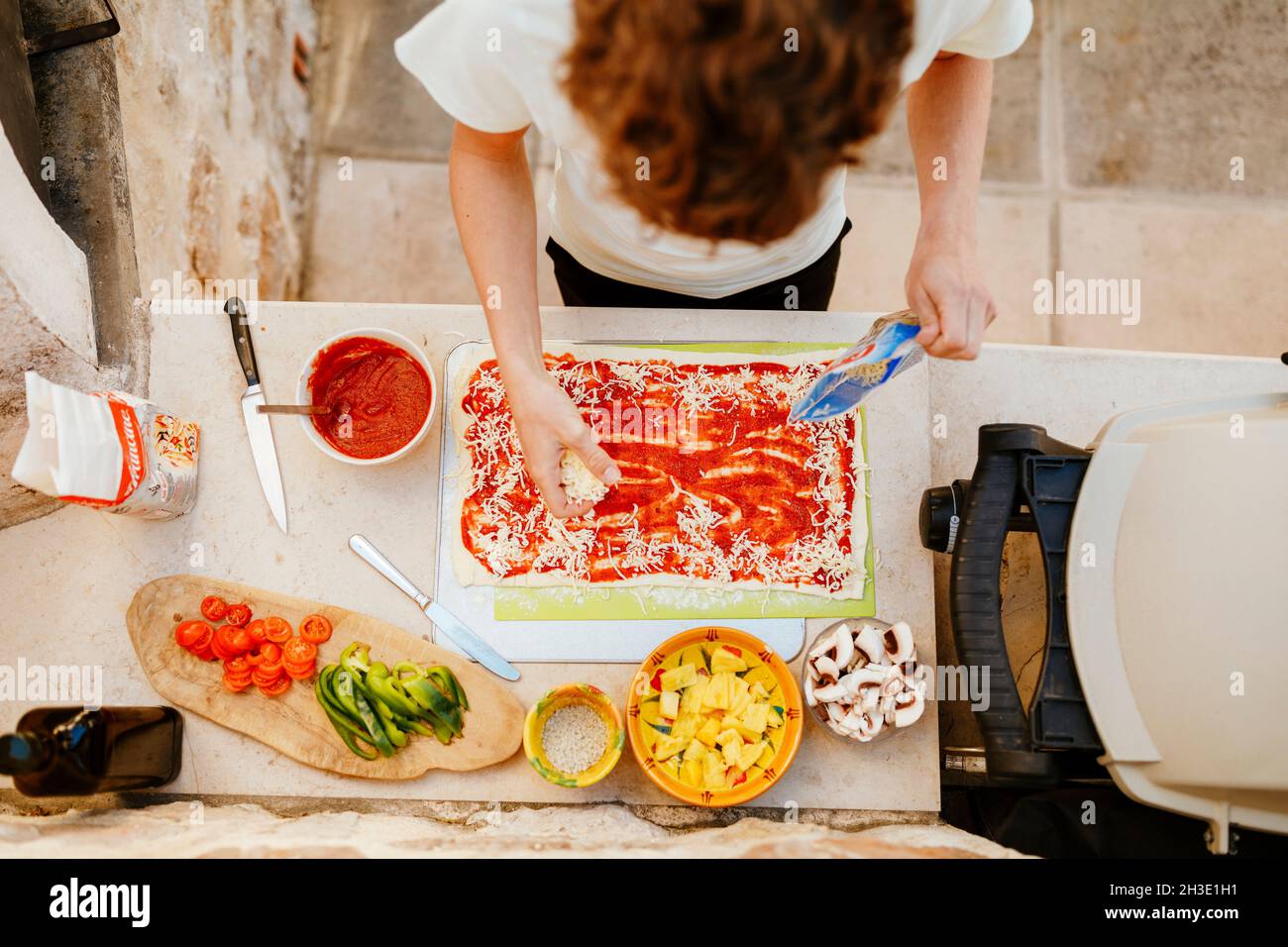 Homemade pizza baking with outdoor traditional pizza over Stock Photo ...