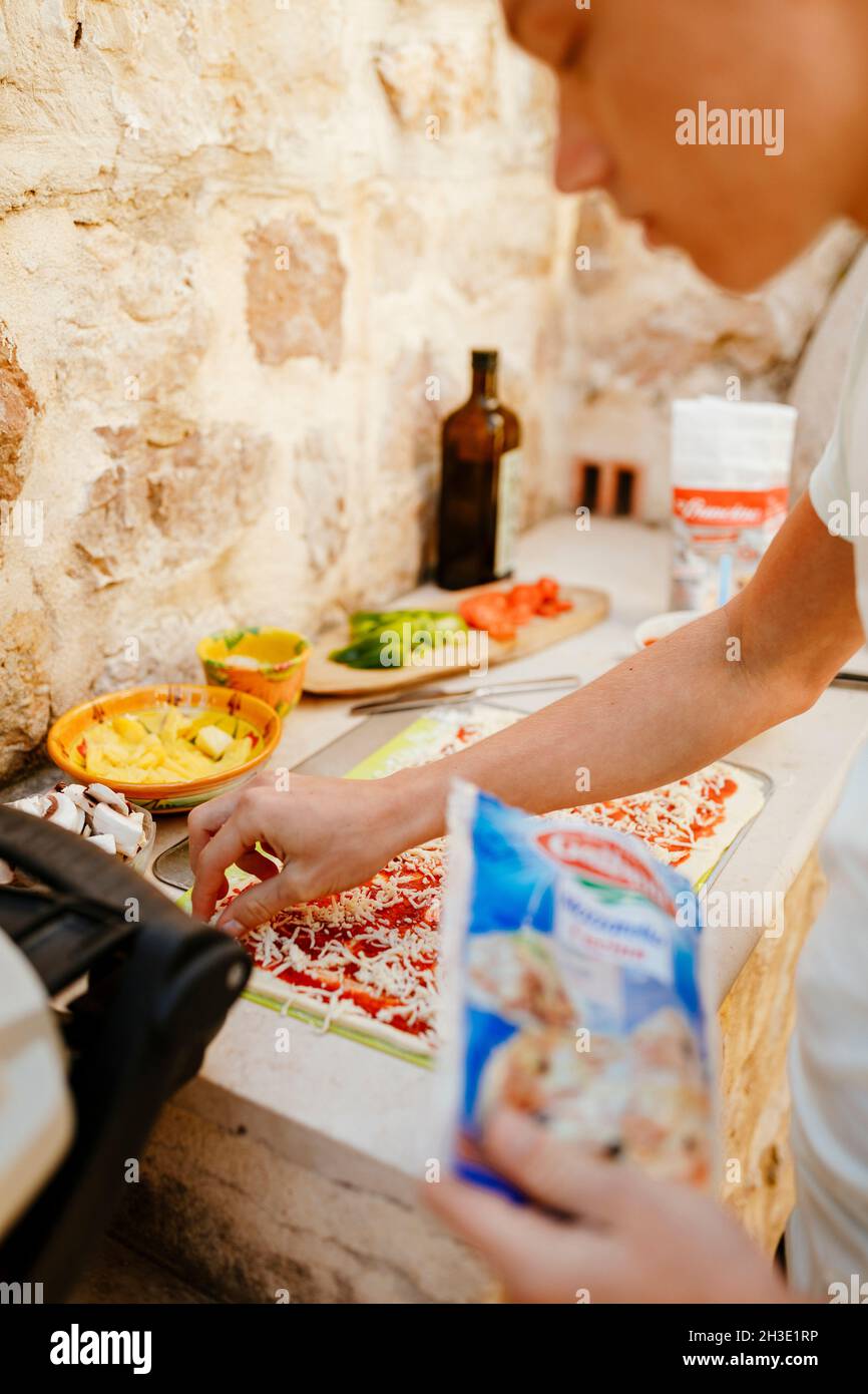 Homemade pizza baking with outdoor traditional pizza over Stock Photo ...