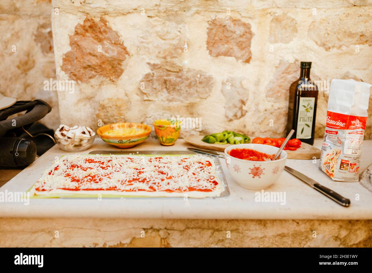 Homemade pizza baking with outdoor traditional pizza over Stock Photo ...
