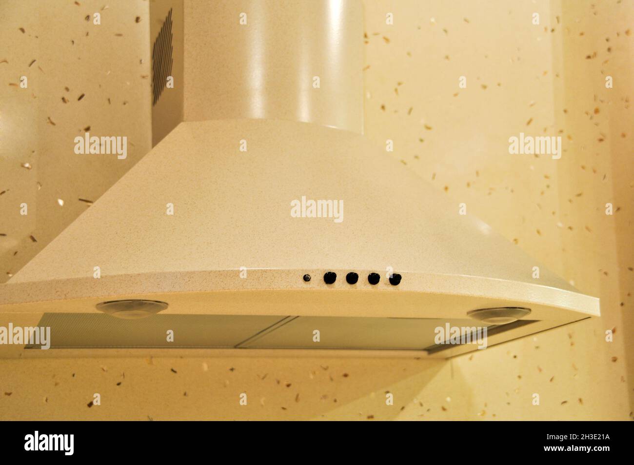 Beige hood in a modern kitchen, electric ventilation system in the ...