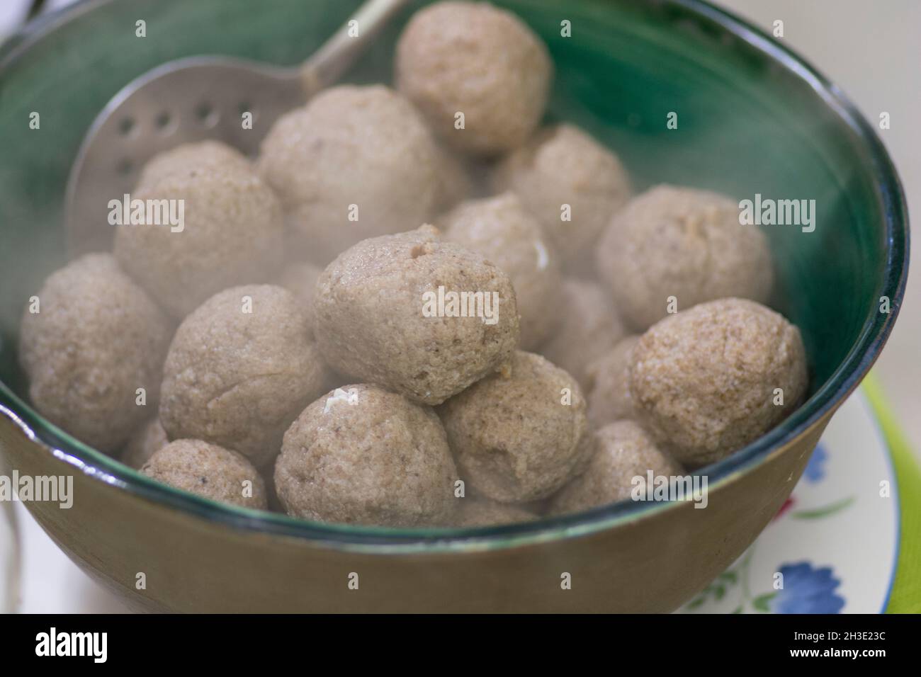 A bowl of Matzah balls, or matzo balls, Ashkenazi Jewish soup dumplings ...