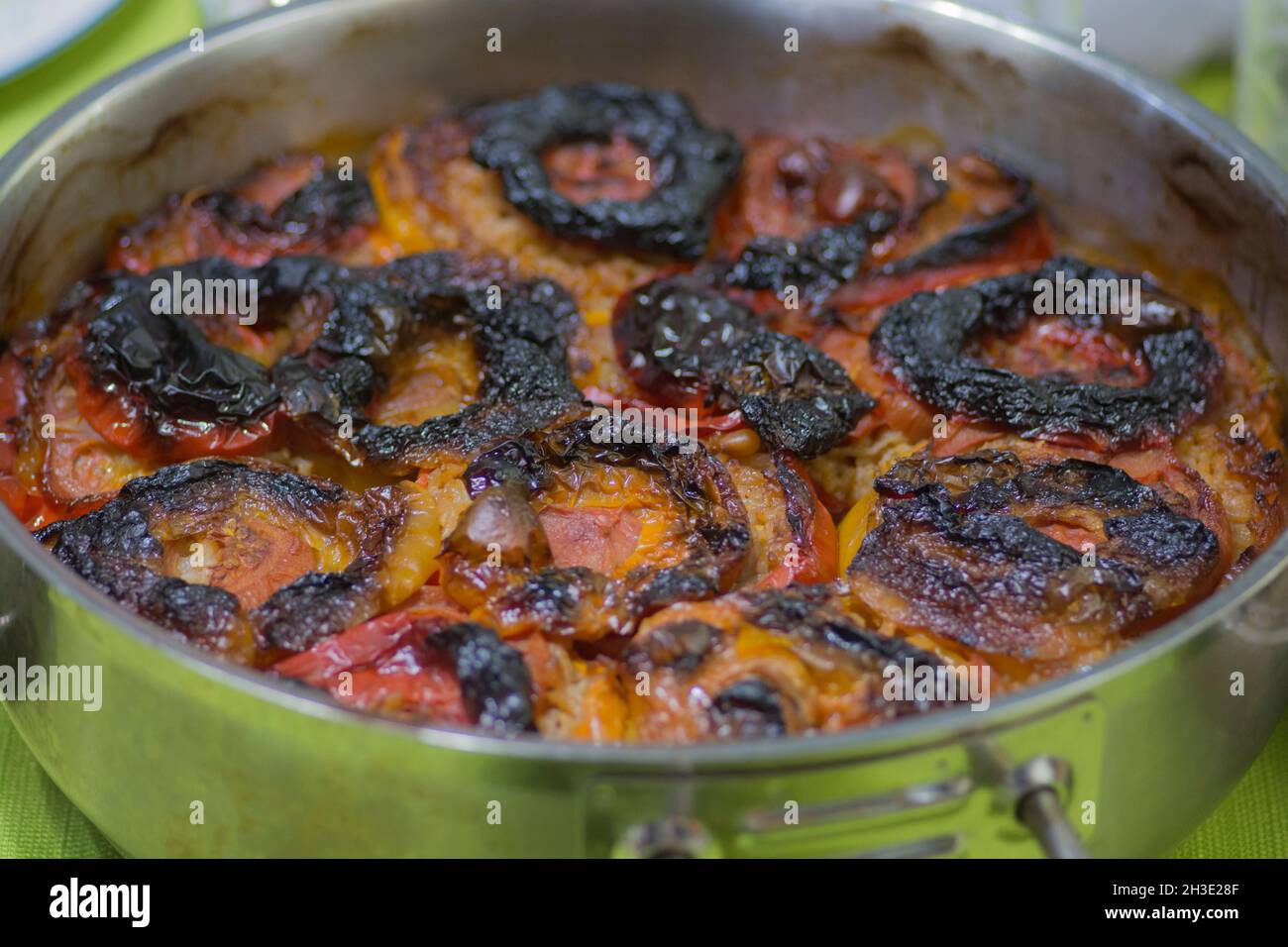 An overhead photo of stuffed red Bell Peppers, in a pot Stock Photo - Alamy