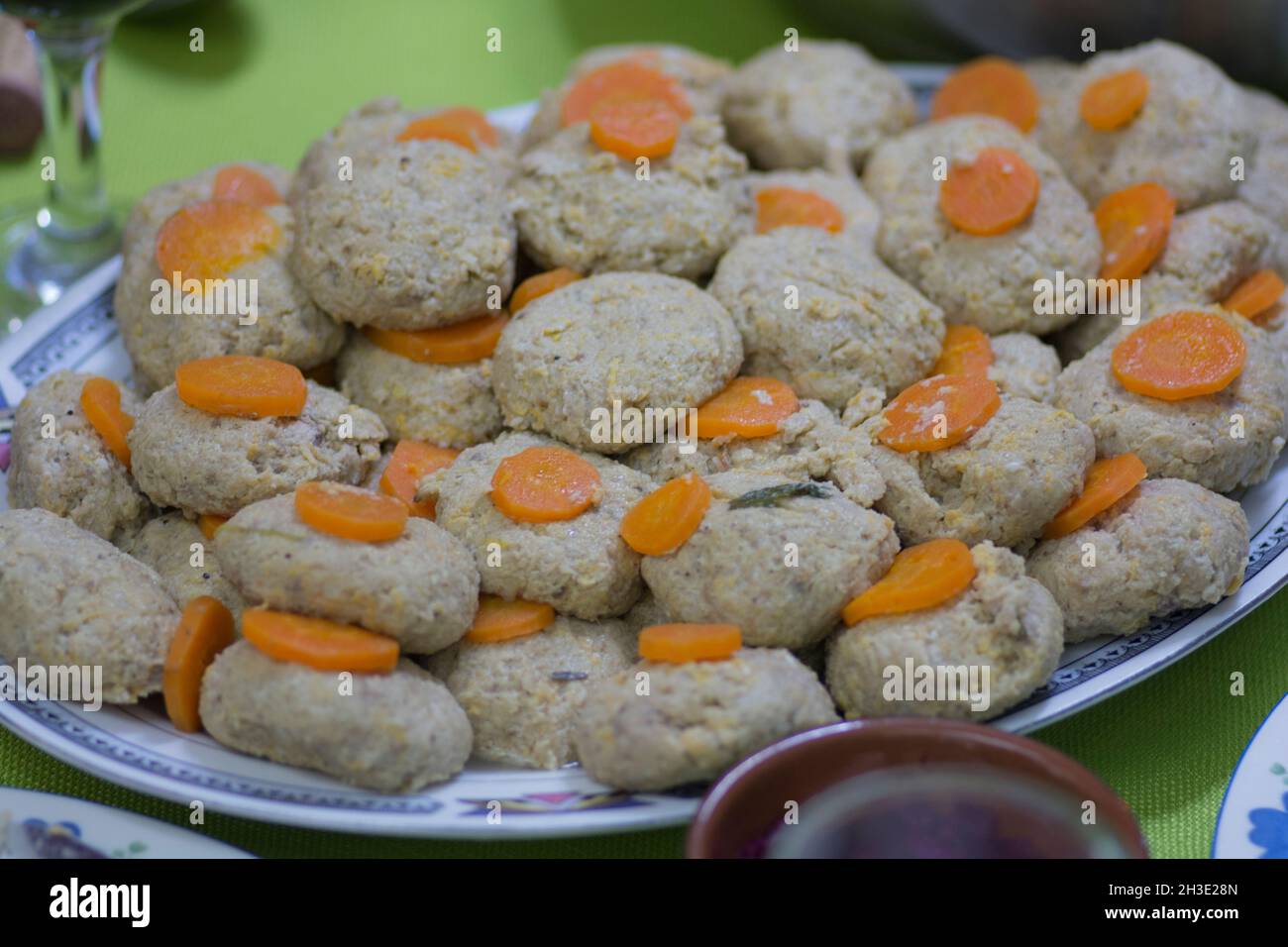 Gefilte fish, "stuffed fish", a dish made from a poached mixture of ...