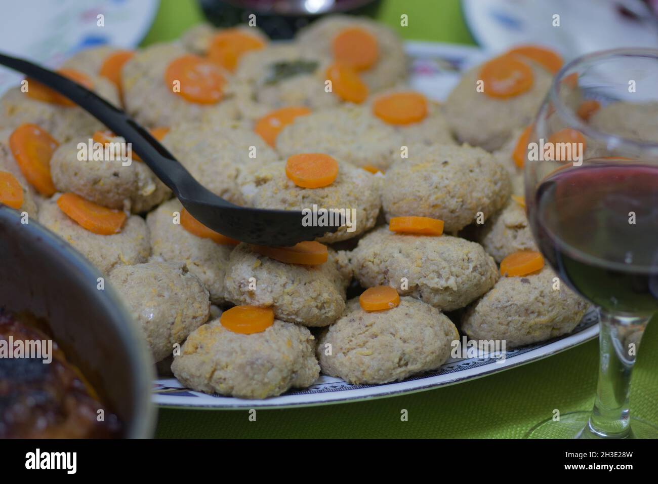 Gefilte fish, "stuffed fish", a dish made from a poached mixture of ...