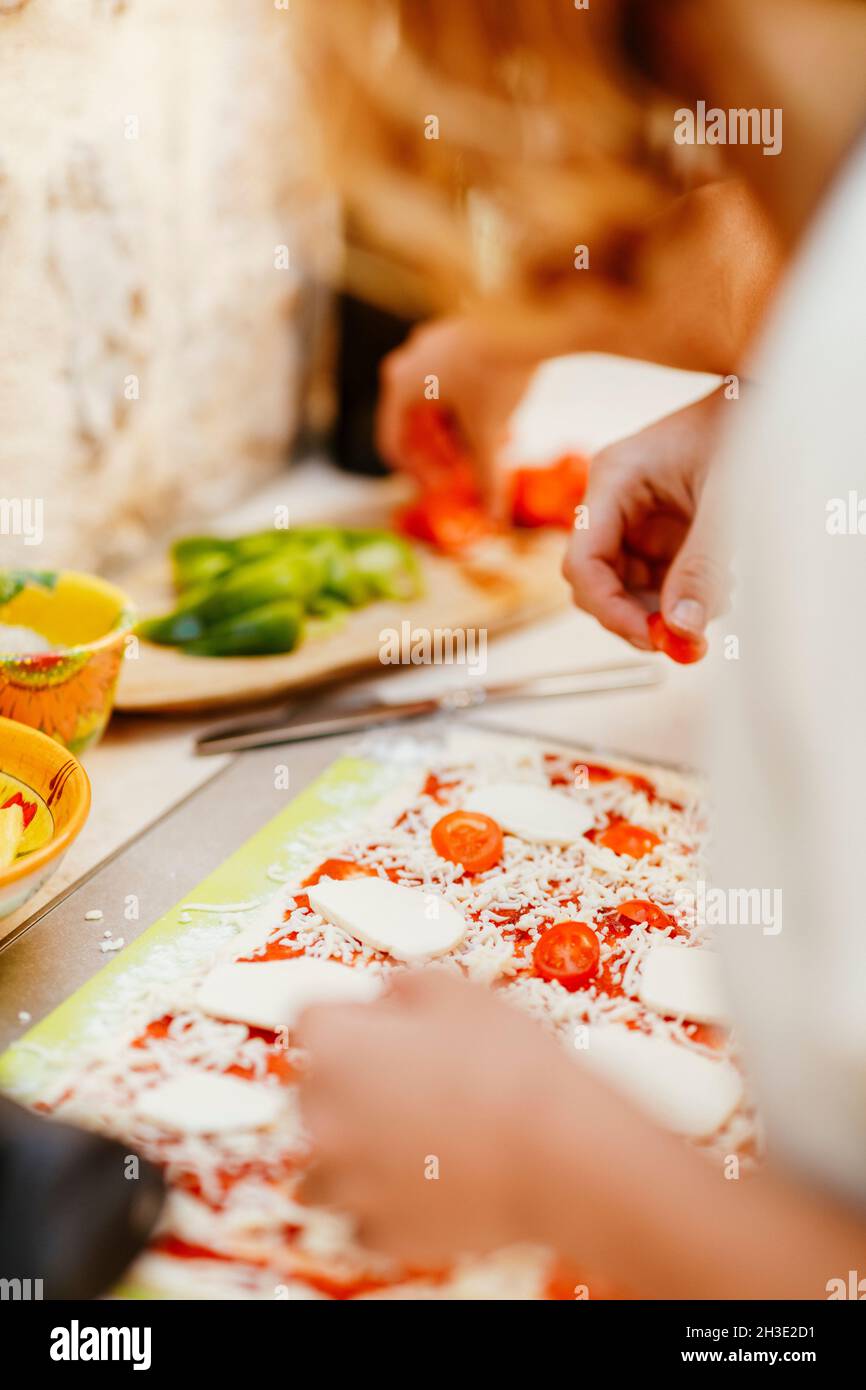 Homemade pizza baking with outdoor traditional pizza over Stock Photo ...