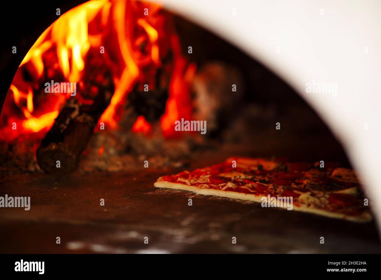 Homemade pizza baking with outdoor traditional pizza over Stock Photo ...