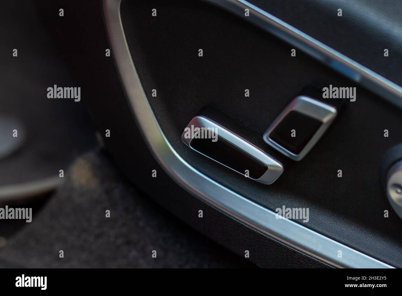 Electric car seat adjustment control panel close up view. Adjustable ...