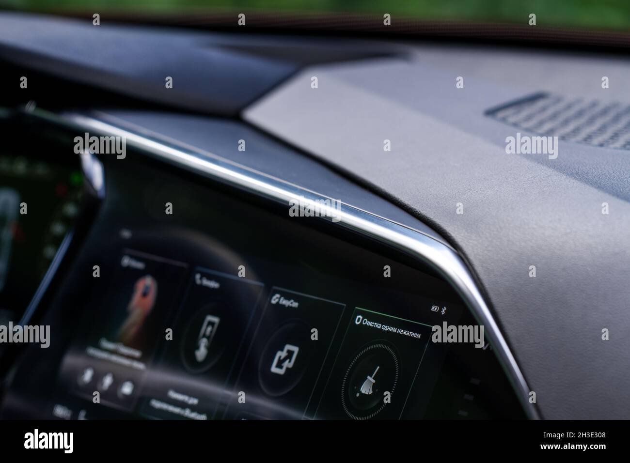 Modern car interior close up view with metallic and plastic details ...