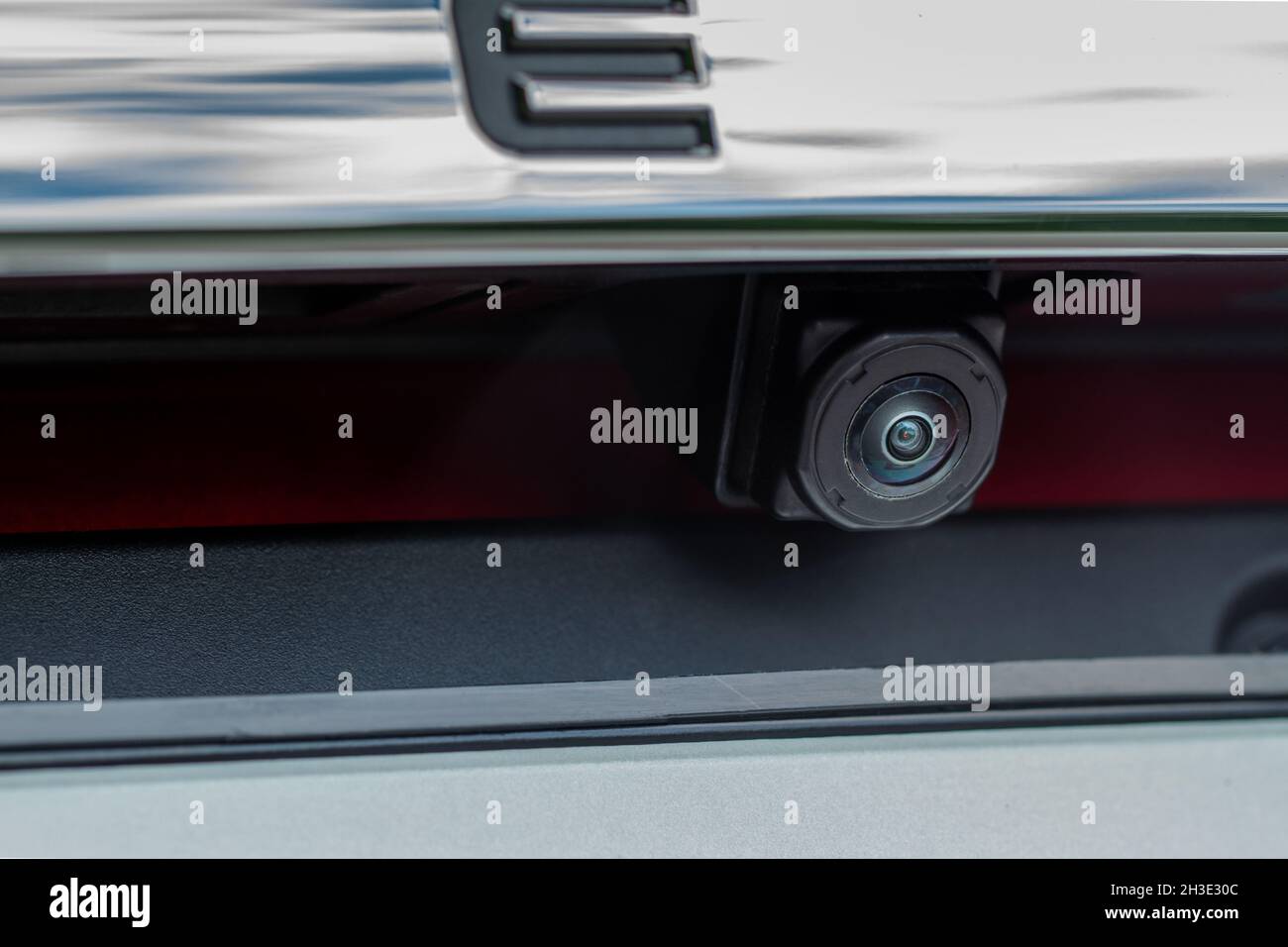 Close up view of rear view parking assist video camera on the car ...