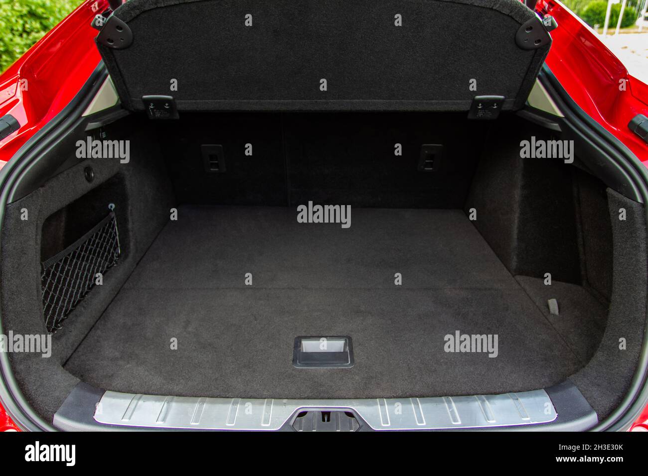 Huge, clean and empty car trunk in interior of compact suv. Rear view ...