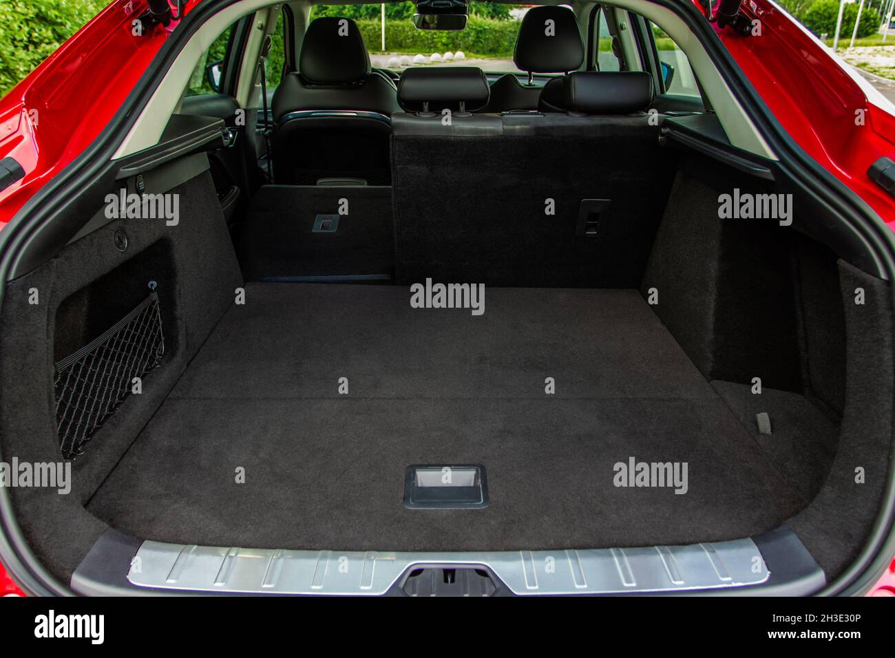 Huge, clean and empty car trunk in interior of compact suv. Rear view ...