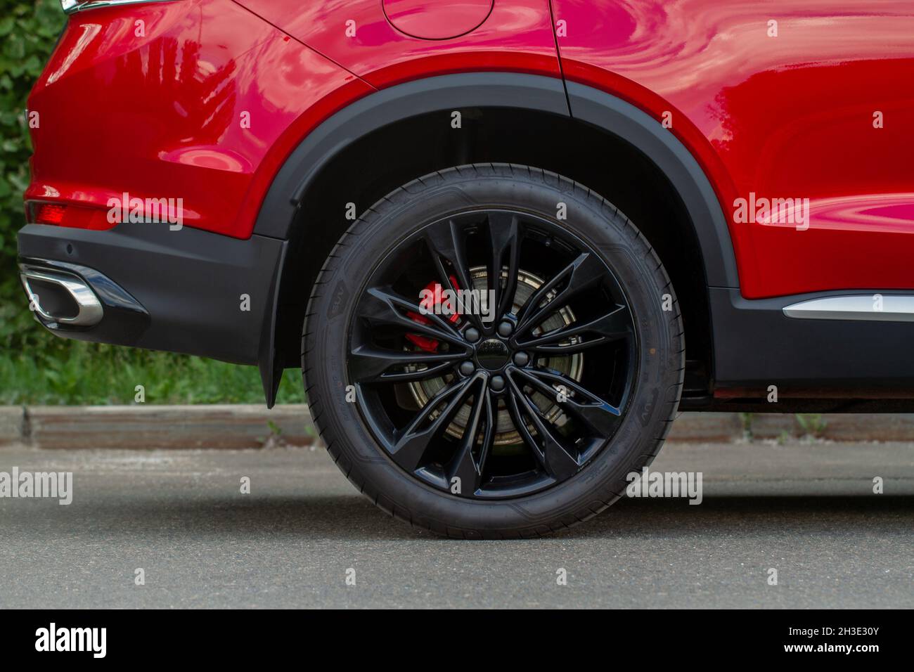 A close up of wheel disk and the side of car. Car wheel on a car Stock ...