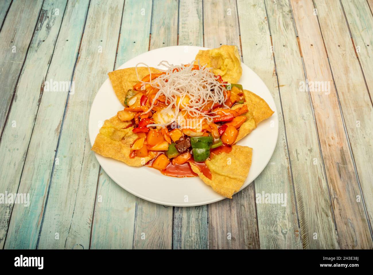 Peruvian style wantan dish with vegetables and fruits sauteed with ...