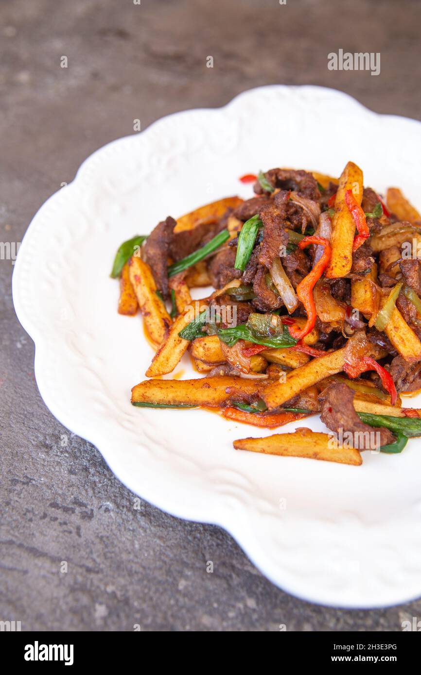 meat with vegetables and potatoes. thai meat Stock Photo - Alamy