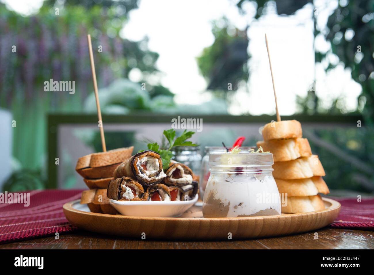 assorted snacks and sandwiches on a tray Stock Photo - Alamy