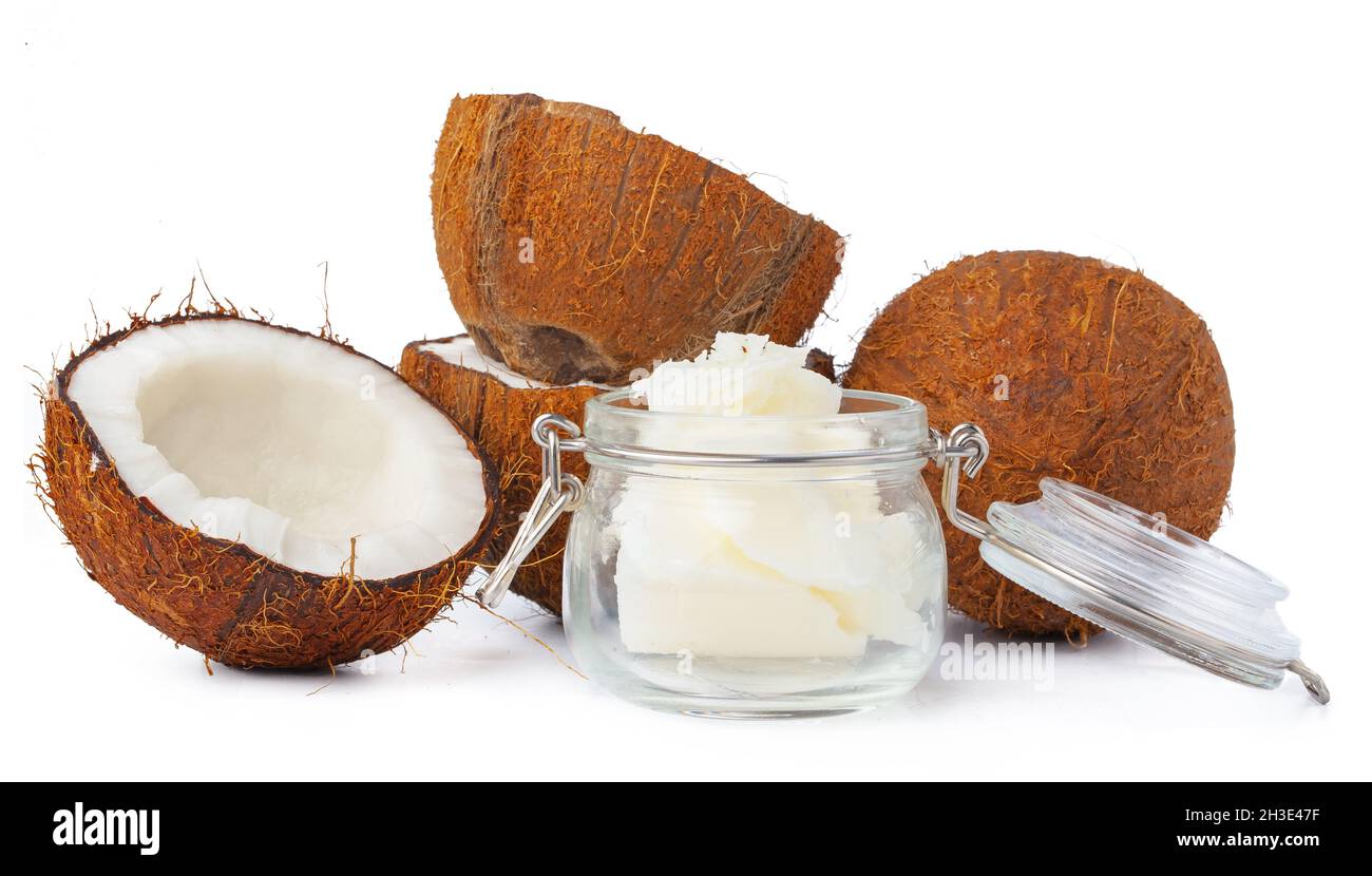 broken coconut on a white background close up Stock Photo - Alamy