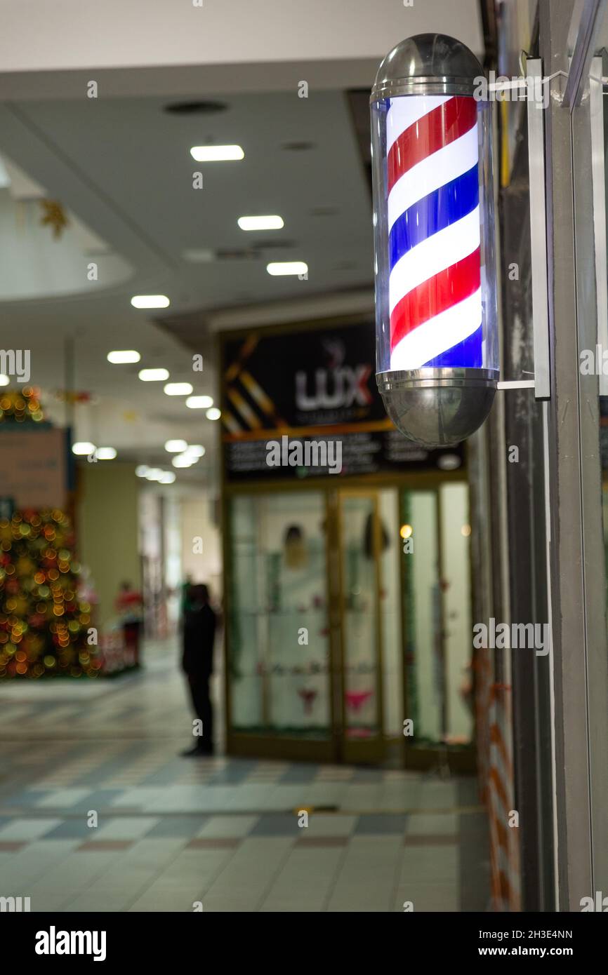 Interior of the mall with shop signs with the blurred background Stock ...