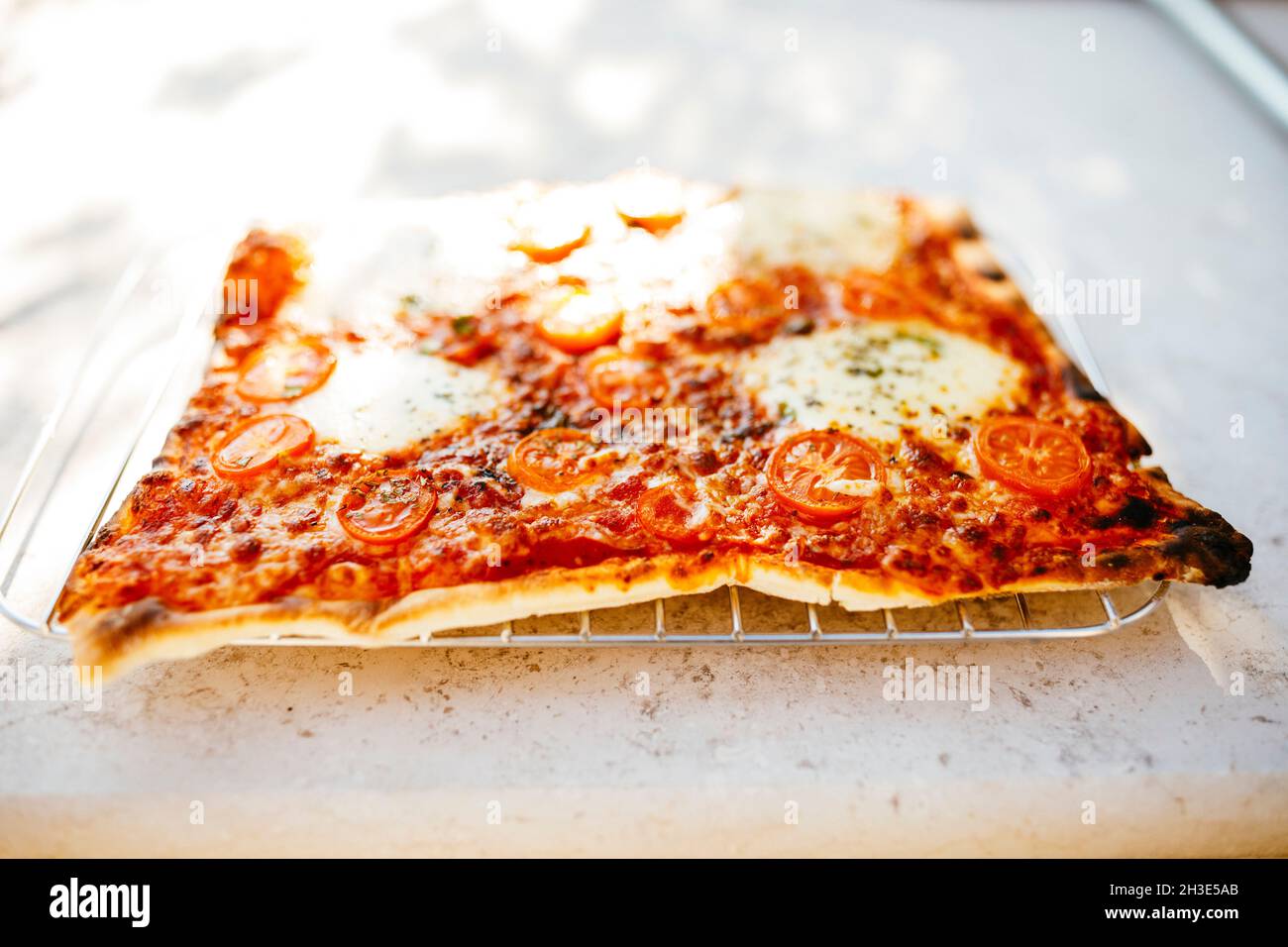 Homemade pizza baking with outdoor traditional pizza over Stock Photo ...