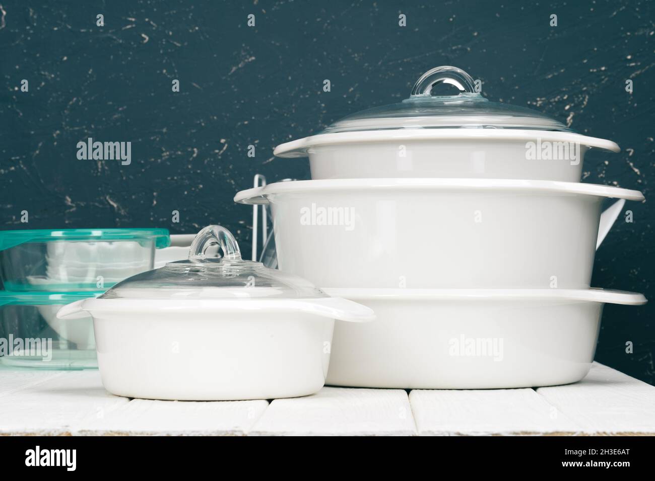 White pot cookware in a kitchen interior Stock Photo - Alamy