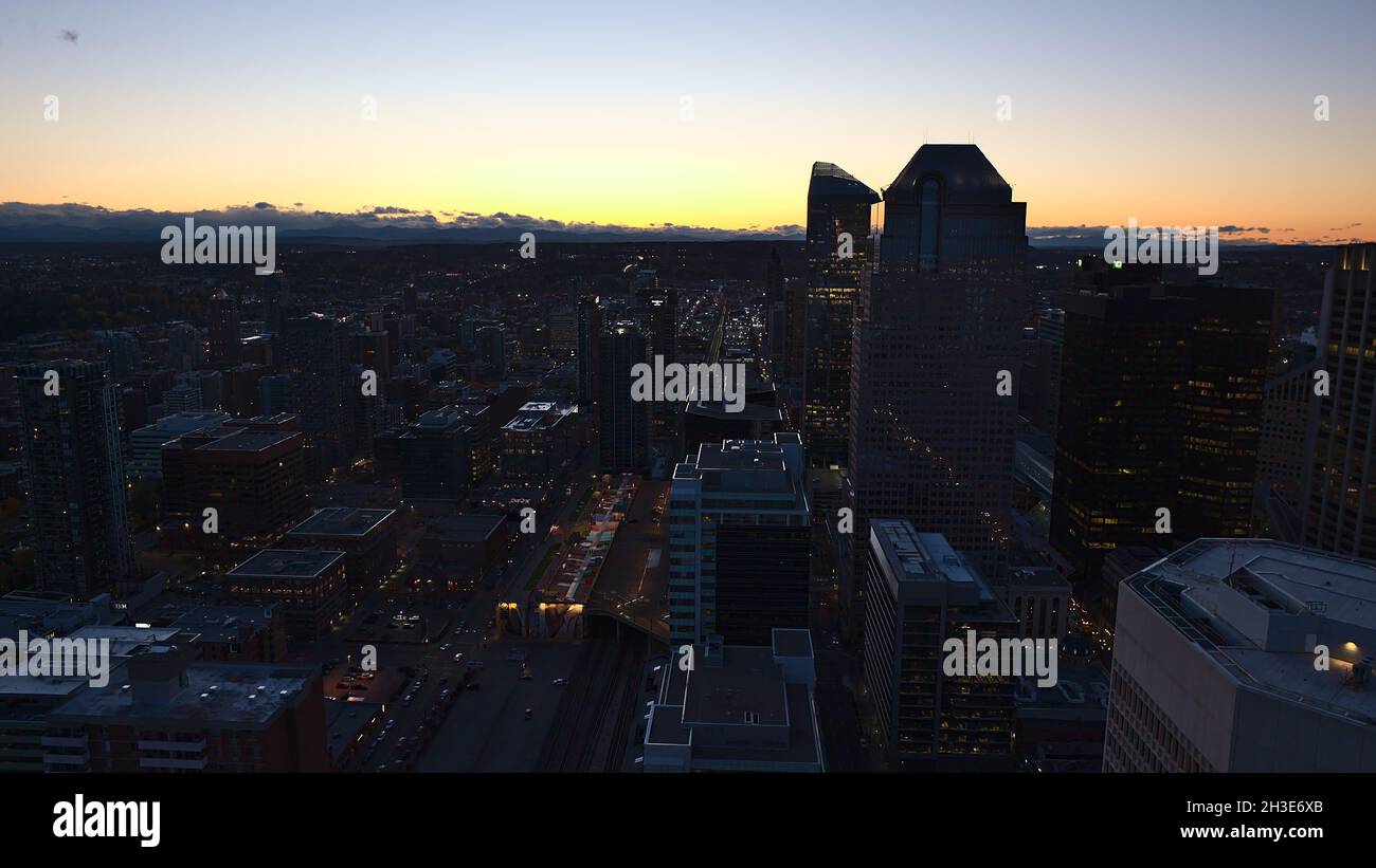Stunning aerial view of western Calgary downtown after sunset with the ...