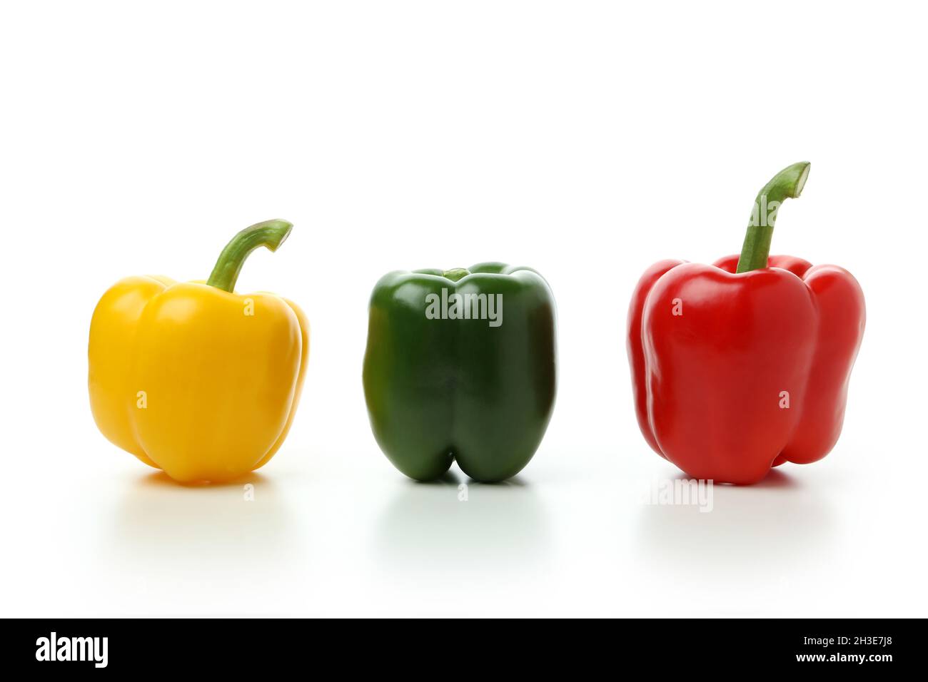 Multi-colored bell pepper isolated on white background Stock Photo - Alamy
